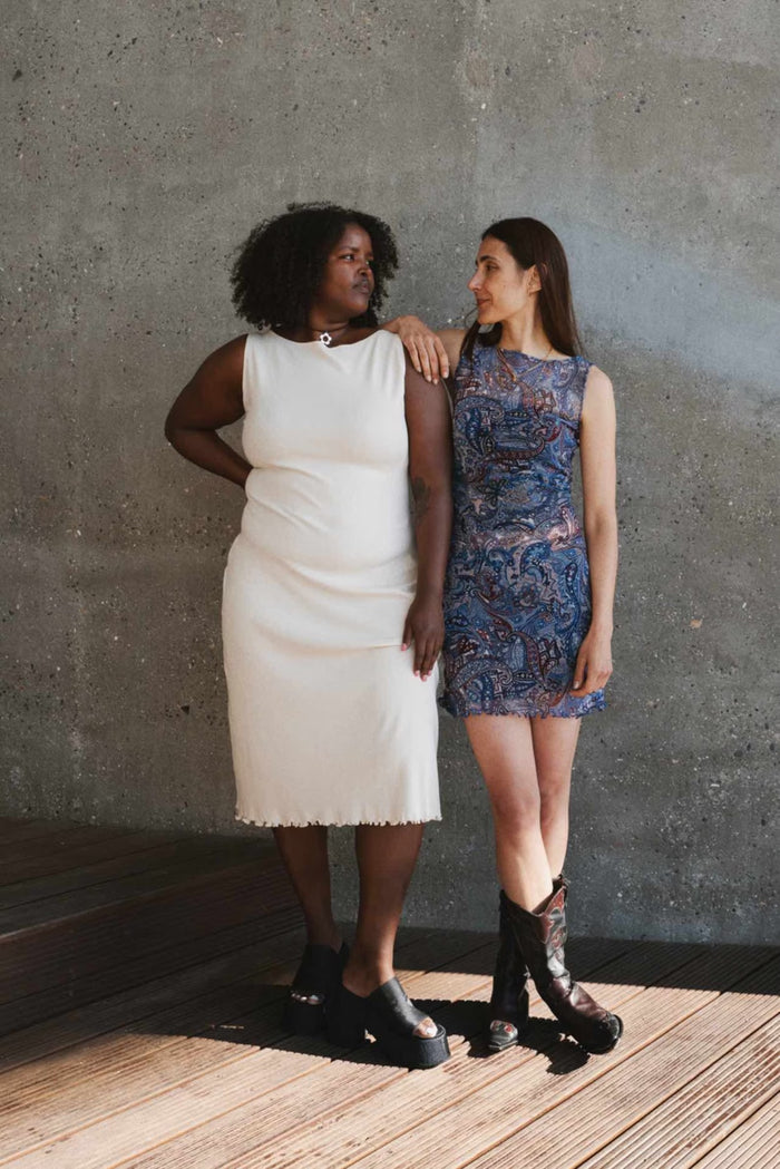 Puff and Pencil Wavy Hem Dress – The Fold Line